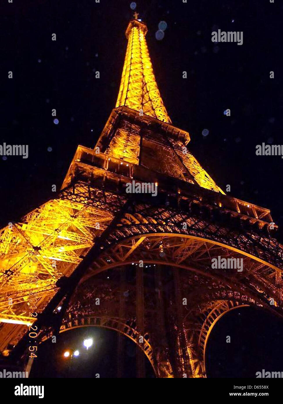 The Eiffel Tower in Paris is beautifully illuminated at night ...