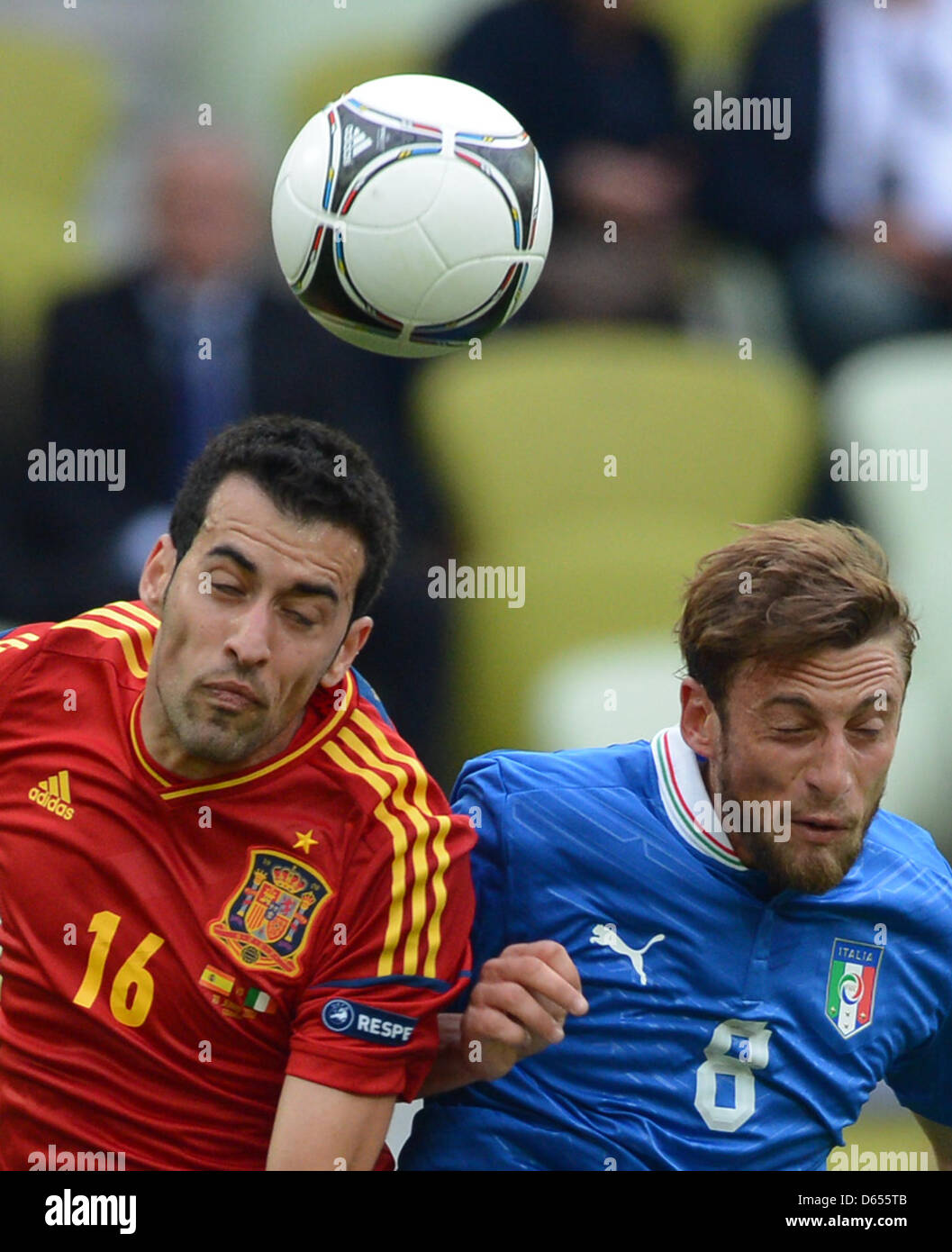 Spain's Xabi Alonso and Italy's Claudio Marchisio vie for the ball ...