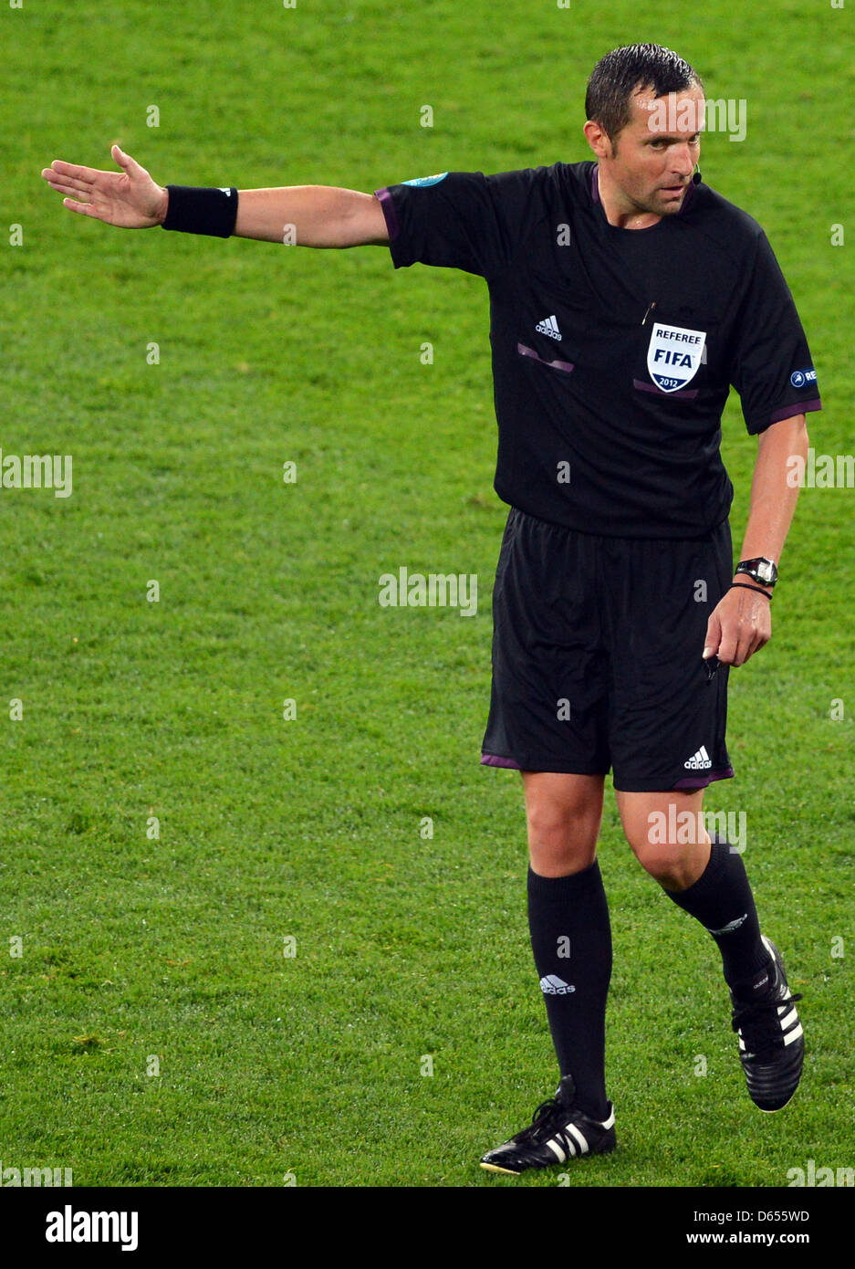 French referee Stephane Lannoy gestures during the UEFA EURO 2012 group ...