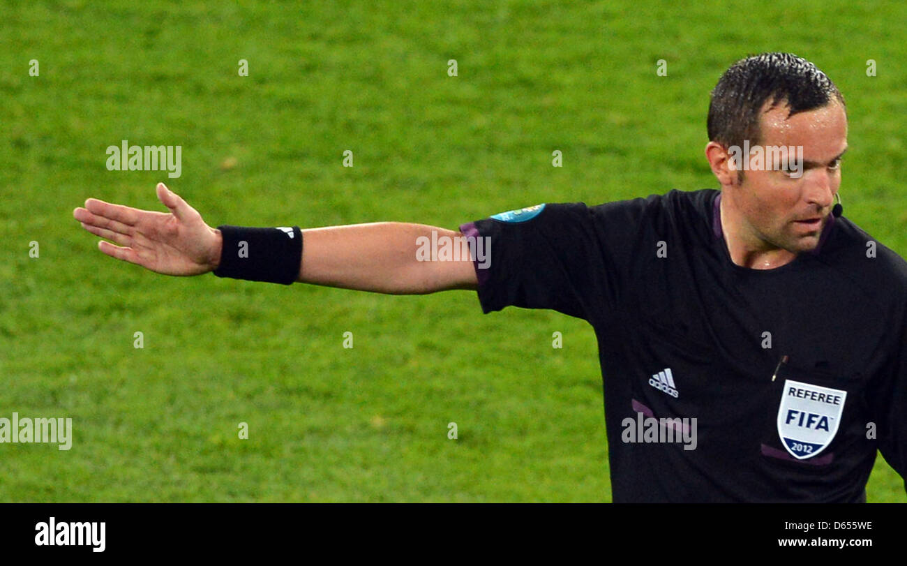 French referee Stephane Lannoy gestures during the UEFA EURO 2012 group ...