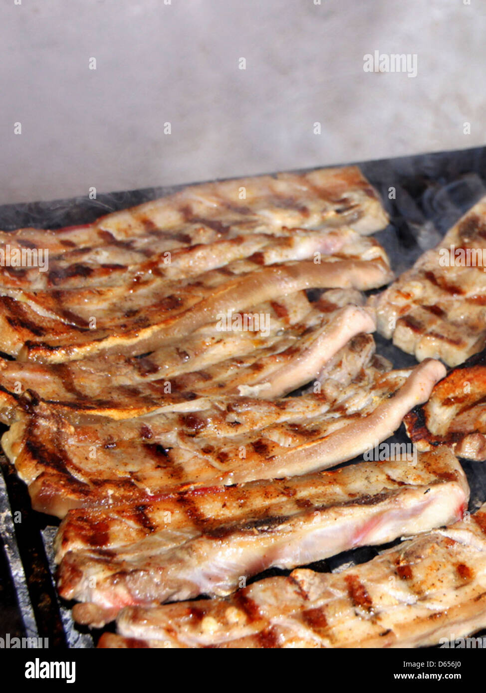 A close-up image of grilled pork ham and BBQ pork meat, showcasing the ...