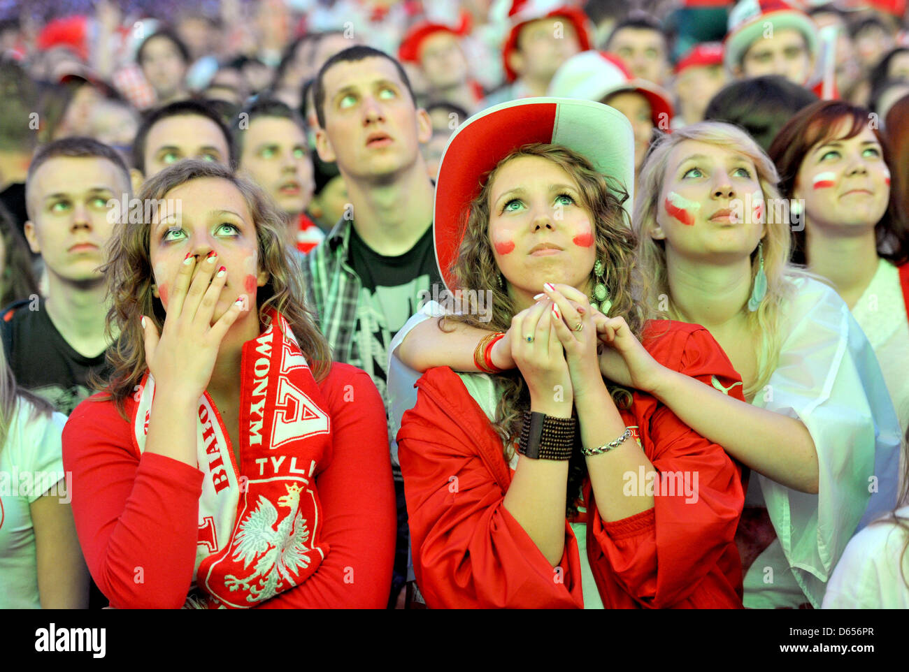 Polish fans attend a public viewing of the EURO 2012 Group A match ...