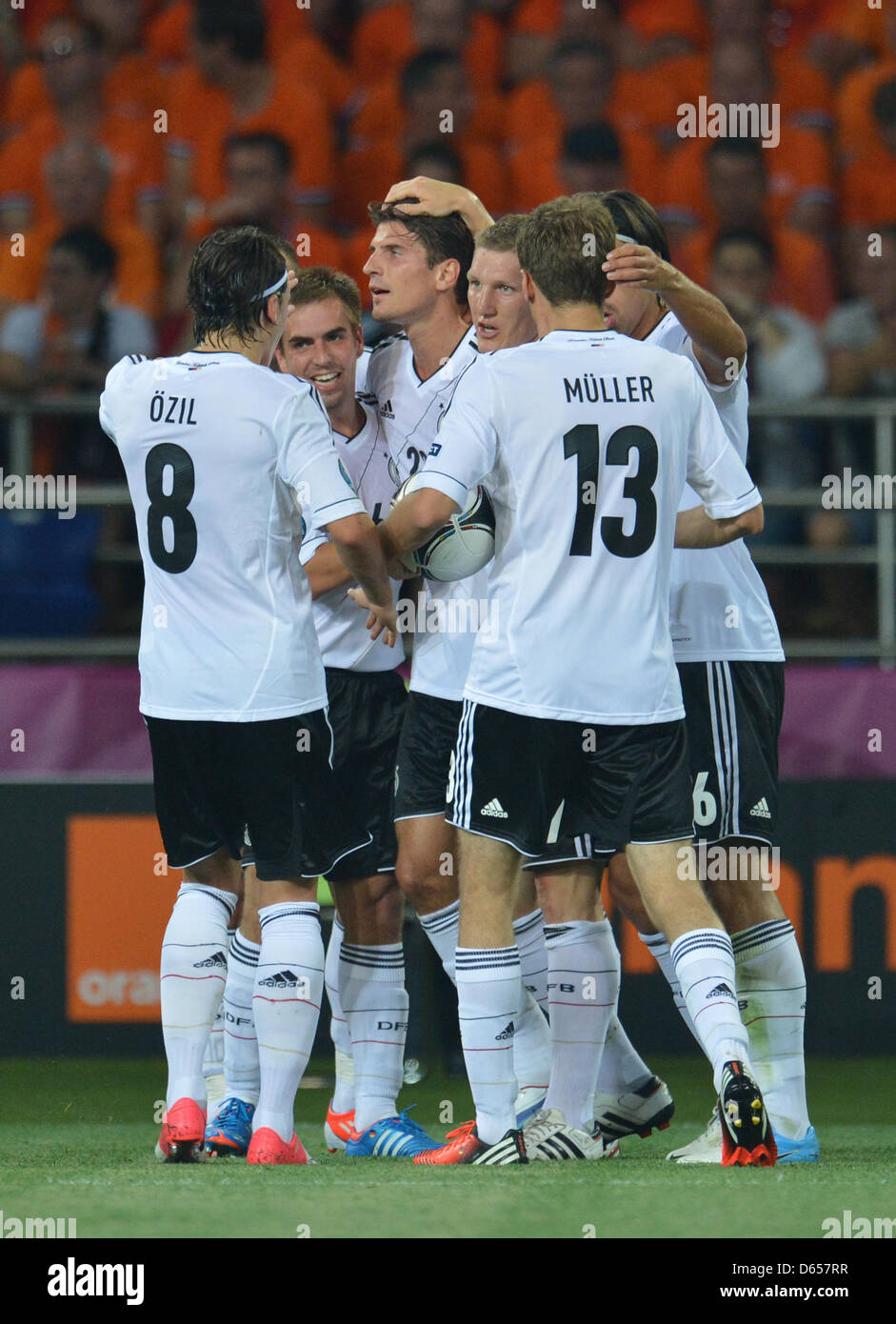 Germany's Mario Gomez (C) celebrates his 1-0 during UEFA EURO 2012 ...