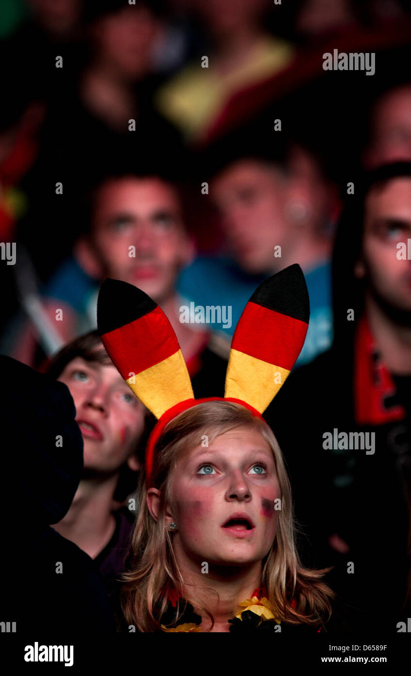 German soccer fans watch the UEFA Euro 2012 soccer match between ...