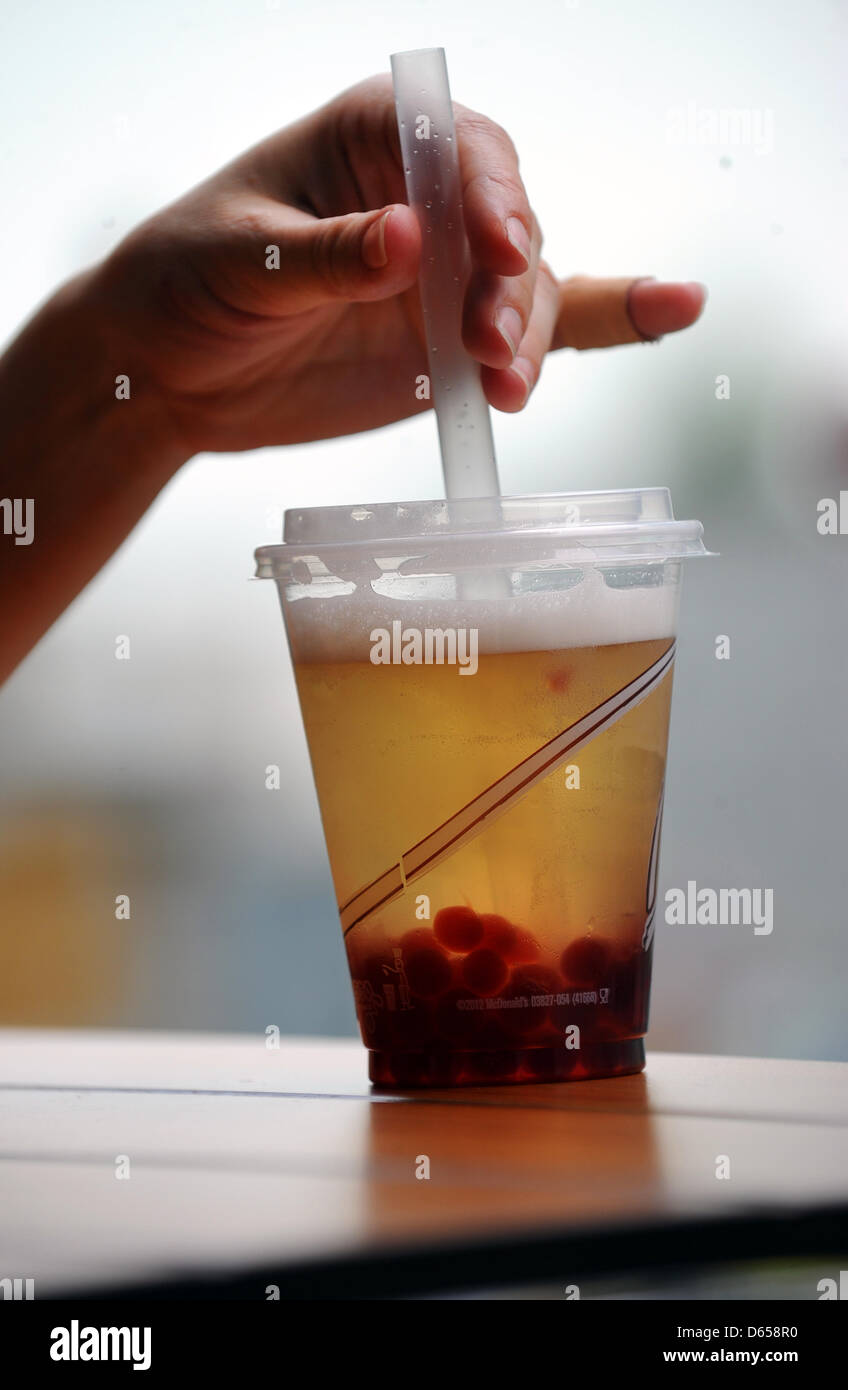A cup of bubble tea is pictured on a table at a McCafe in Berlin ...