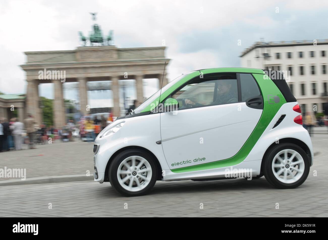The new electric car of Daimler AG, the smart electric drive, passes in ...