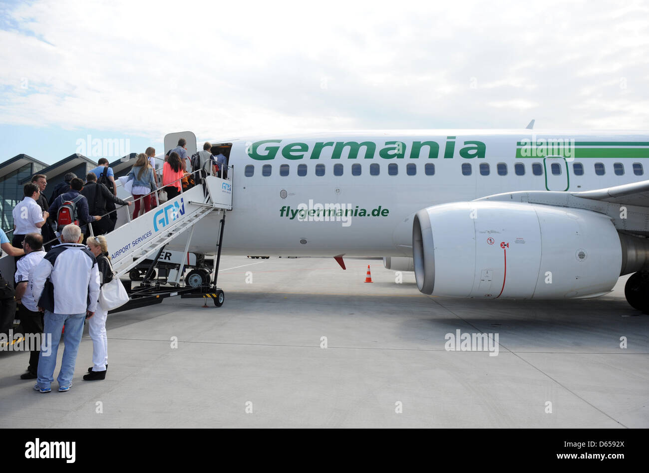 Passengers and fellow travellers of the German national soccer team ...