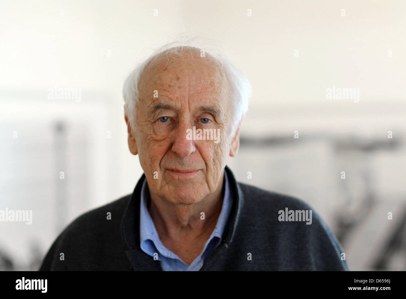Photographer Thomas Hoepker poses in front of photographies of his from ...