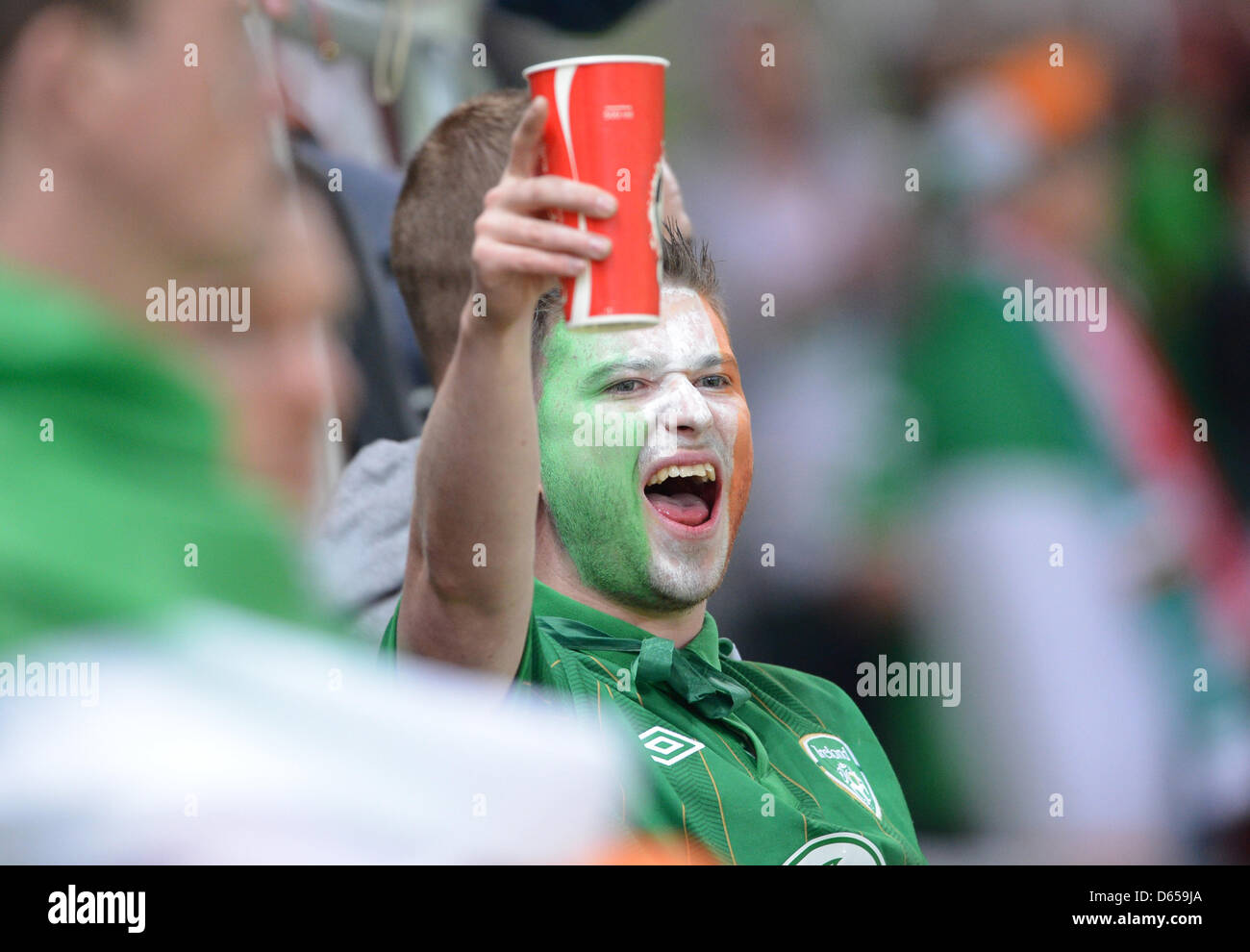 An Irish fan cheers during UEFA EURO 2012 group C soccer match Spain vs ...