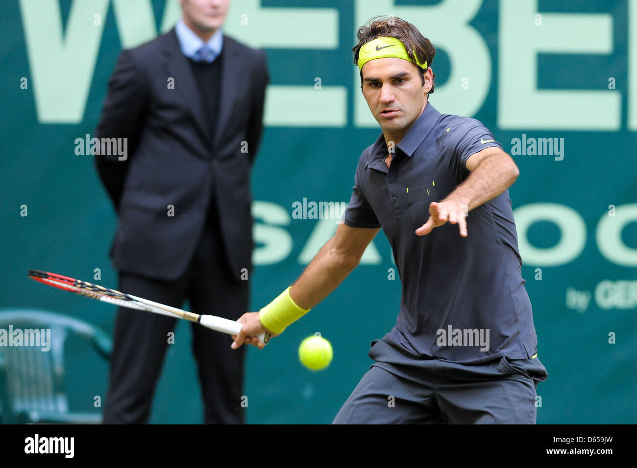 Swiss tennis player Roger Federer plays during the Gerry Weber Open in ...