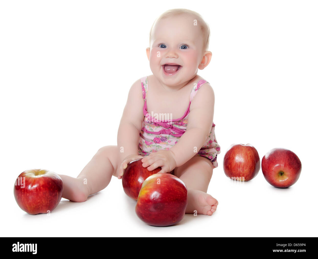 The little baby with red apples Stock Photo - Alamy