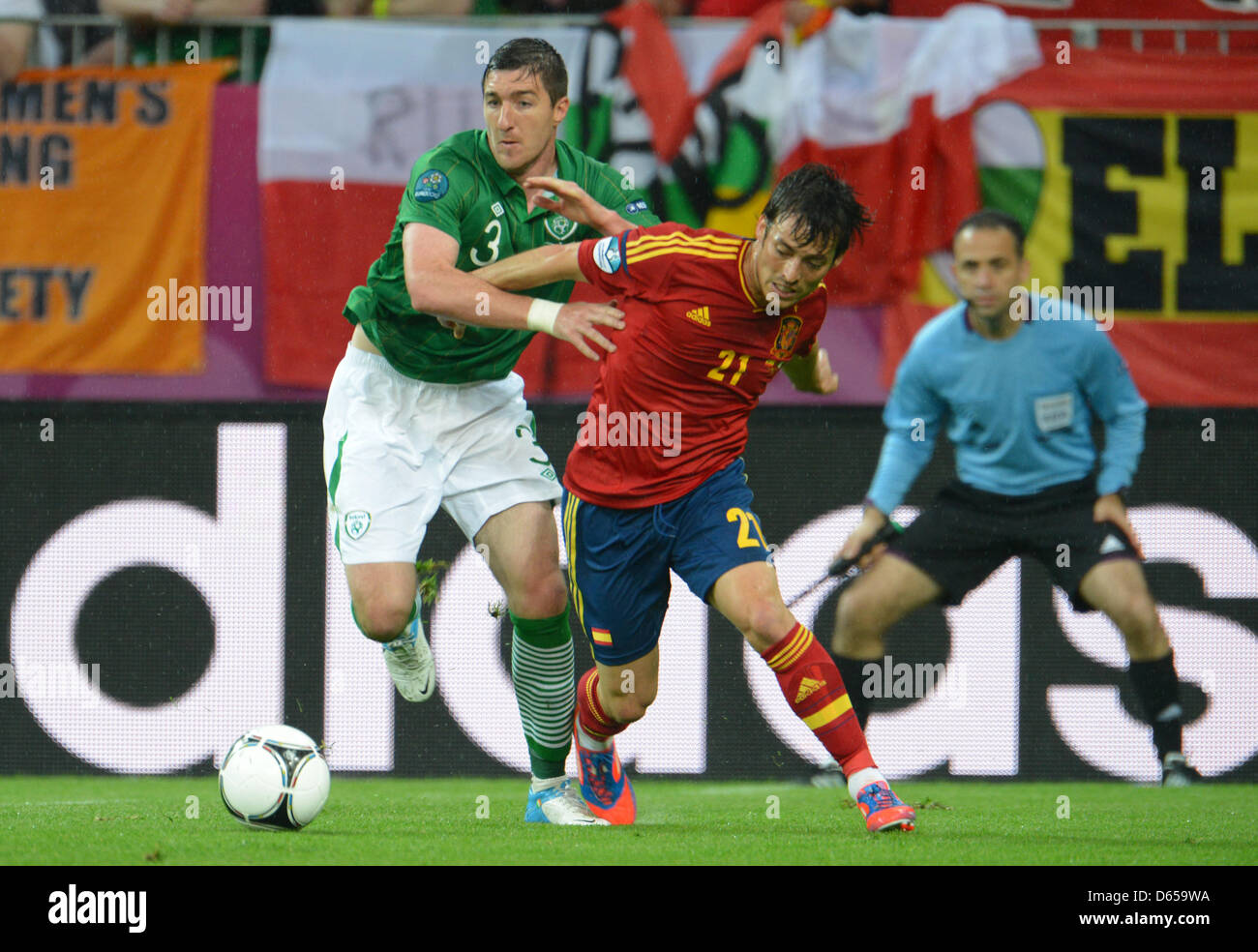 Spain's David Silva (R) and Ireland's Stephen Ward vie for the ball ...