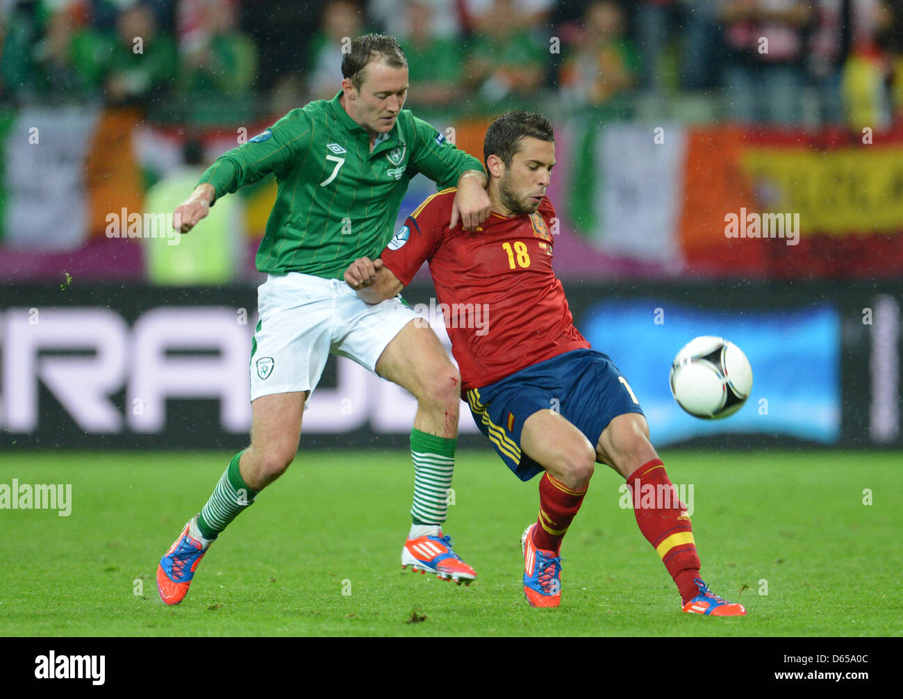 Spain's Jordi Alba (R) and Ireland's Aiden McGeady vie for the ball ...