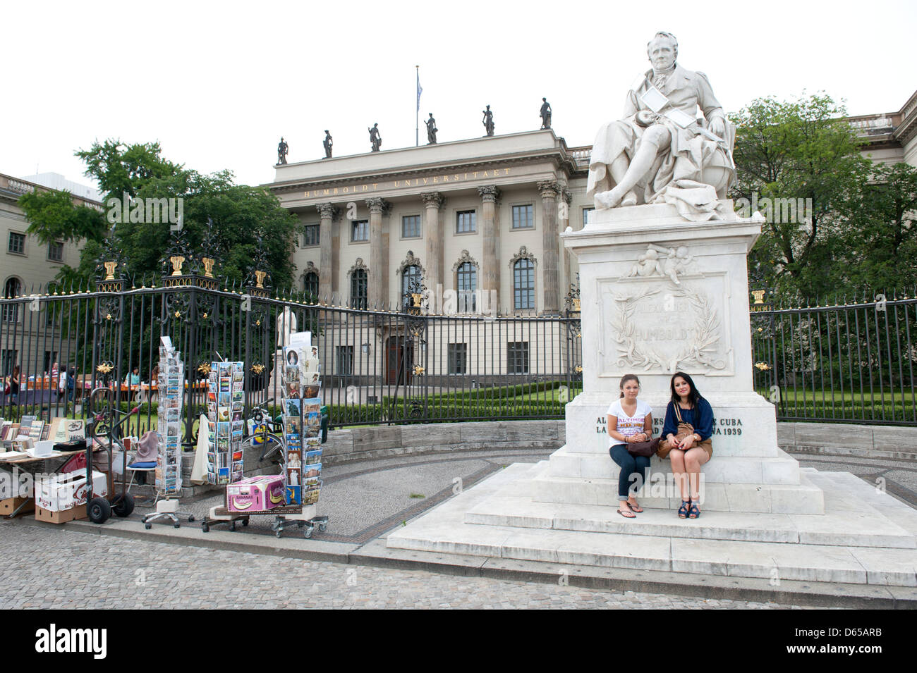 A monument to Alexander von Humboldt stands in front of the entrance of ...