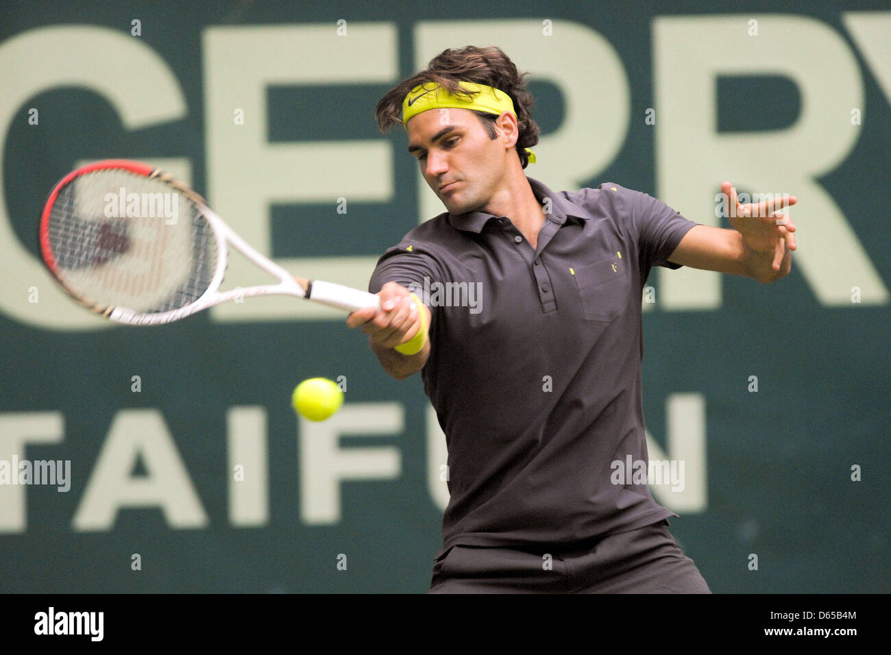 Switzerland's tennis player Roger Federer hits the ball against Russia ...
