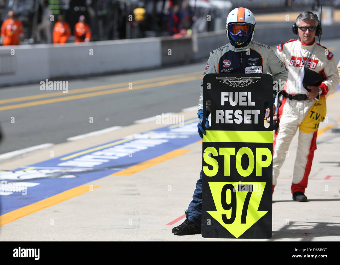 A mechanic of Aston Martin Racing waits for the LM GTE Pro class Astin ...