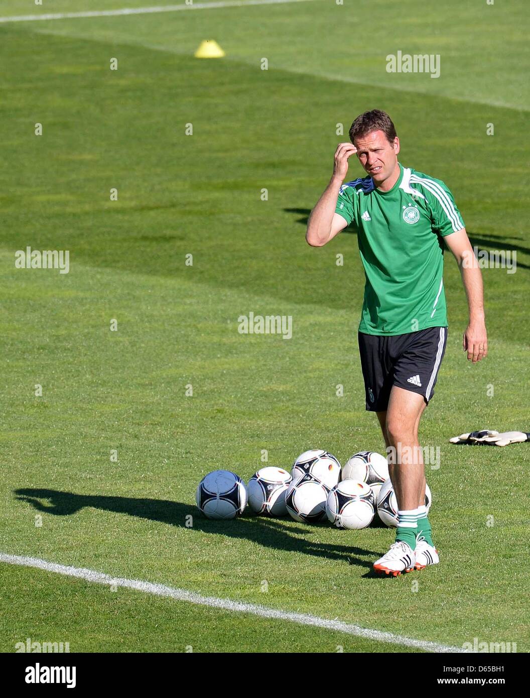 Germany's team manager Oliver Bierhoff walks on the pitch during a ...