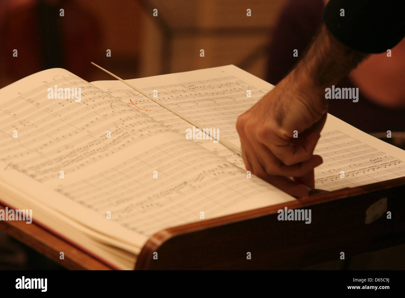 Conductor with conductors baton hi-res stock photography and images - Alamy