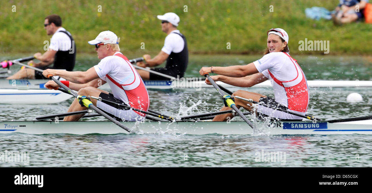 Norwegian rowers Kjetil Borch (L) and Nils Jacob Hoff win the M2x event ...