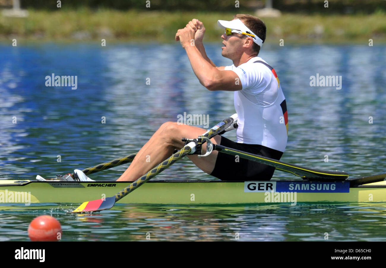 German rower Kjetil Borch celebrates his victory of the M1x event at ...