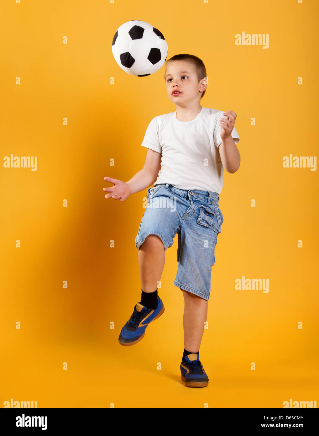 Portrait of a little football fan boy Stock Photo - Alamy