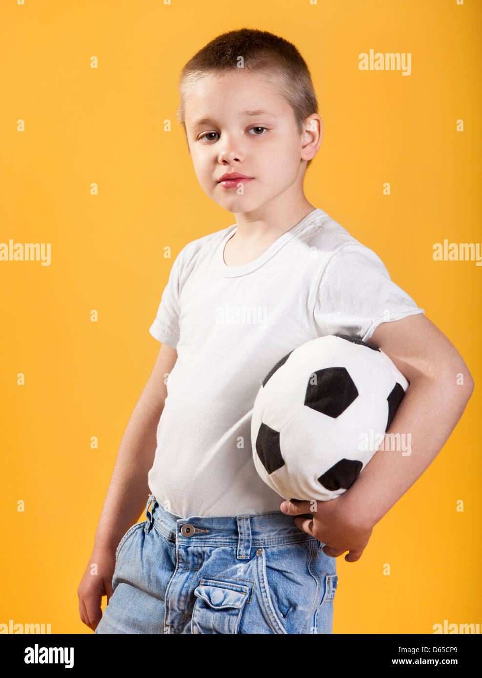 Portrait of a little football fan boy Stock Photo - Alamy
