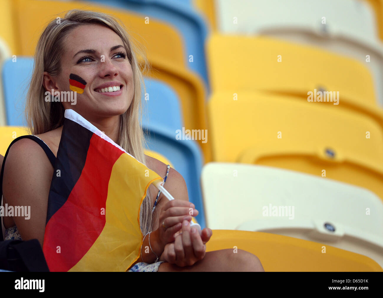 A German fan sits on the stand prior to the UEFA EURO 2012 group B ...