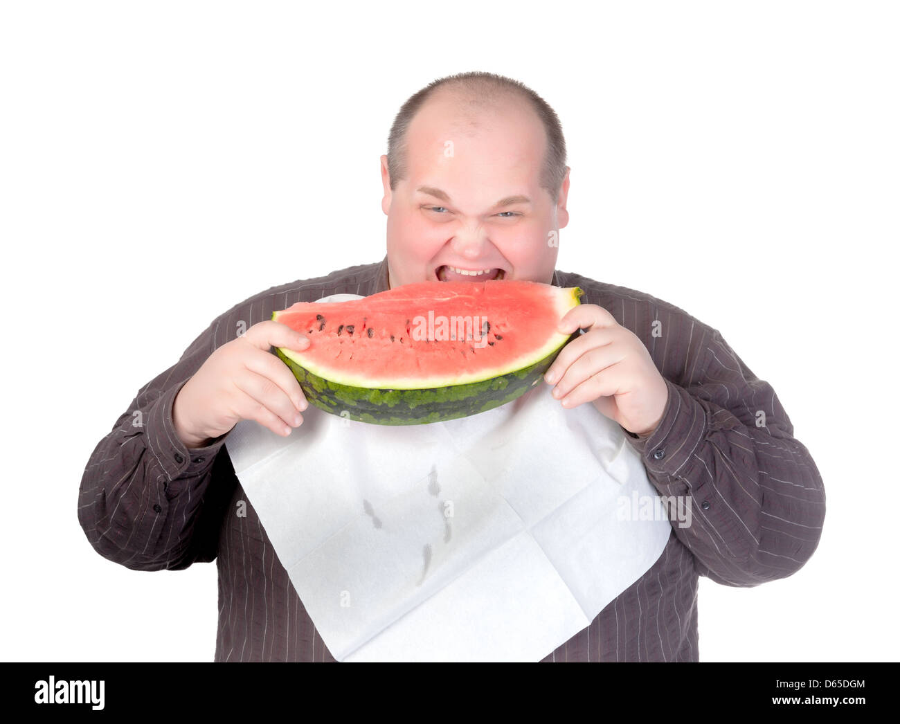 Obese man eating watermelon Stock Photo - Alamy