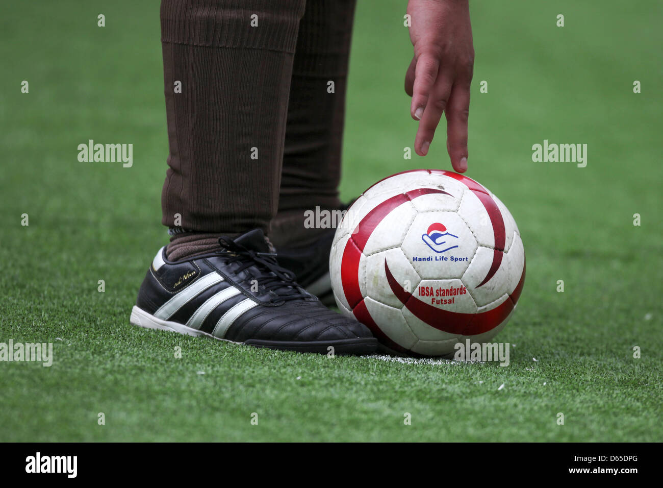 A blind player prepares for a free kick during a Blind Bundesliga match ...