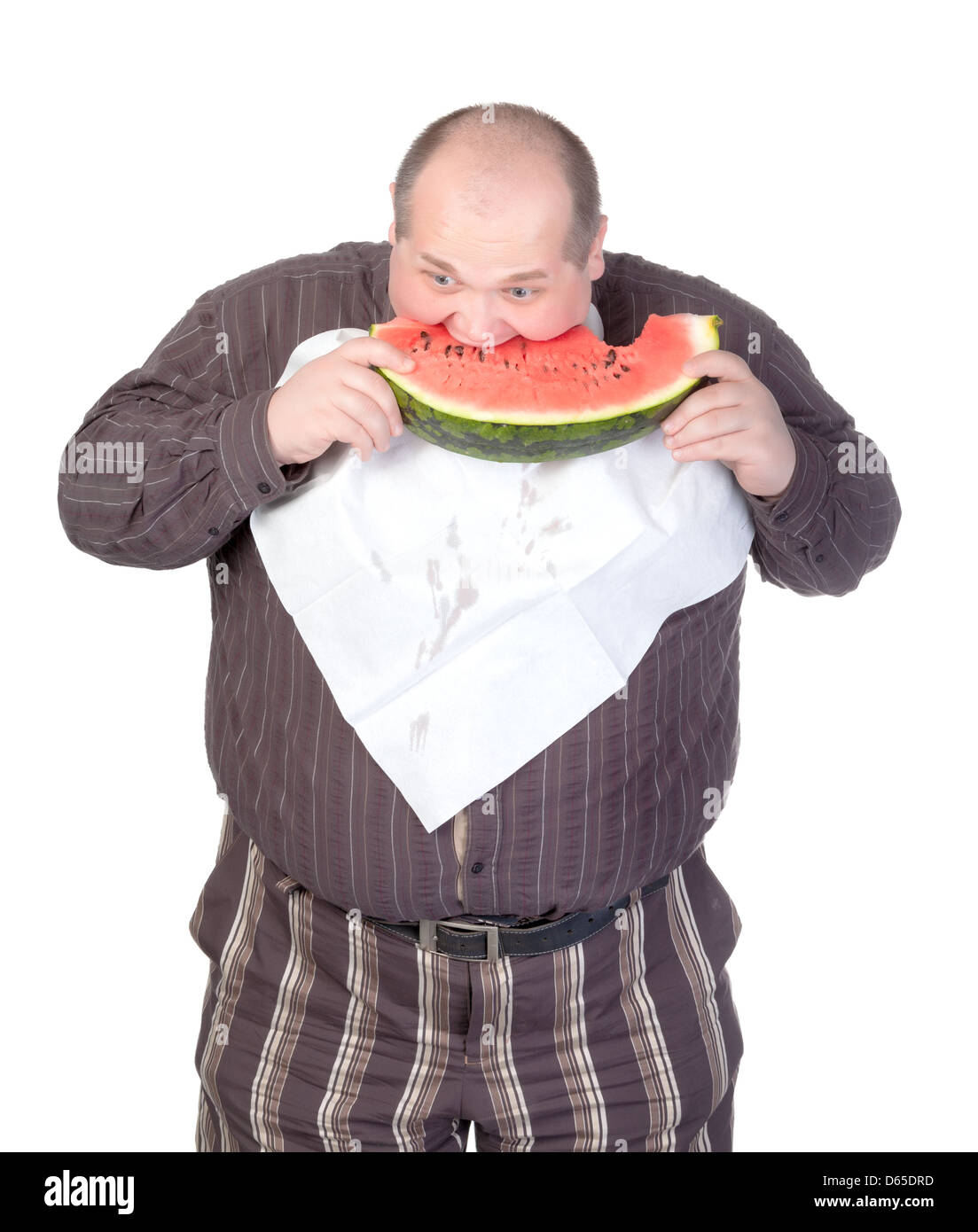 Obese man eating watermelon Stock Photo - Alamy