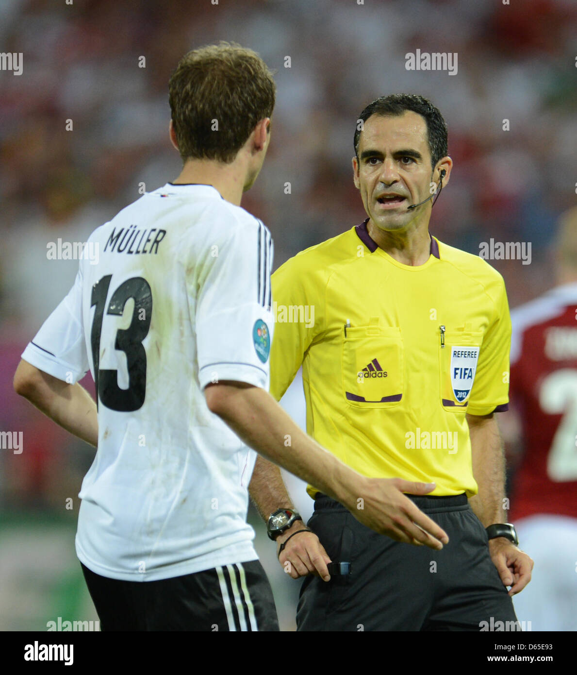 Germany's Thomas Mueller (L) argues with referee Carlos Velasco ...