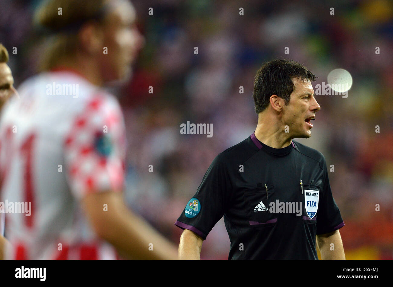German referee Wolfgang Stark (R) during UEFA EURO 2012 group C soccer ...