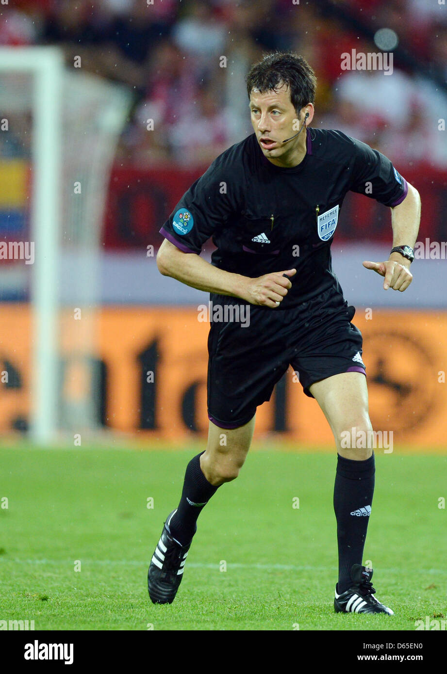 German referee Wolfgang Stark gestures during UEFA EURO 2012 group C ...