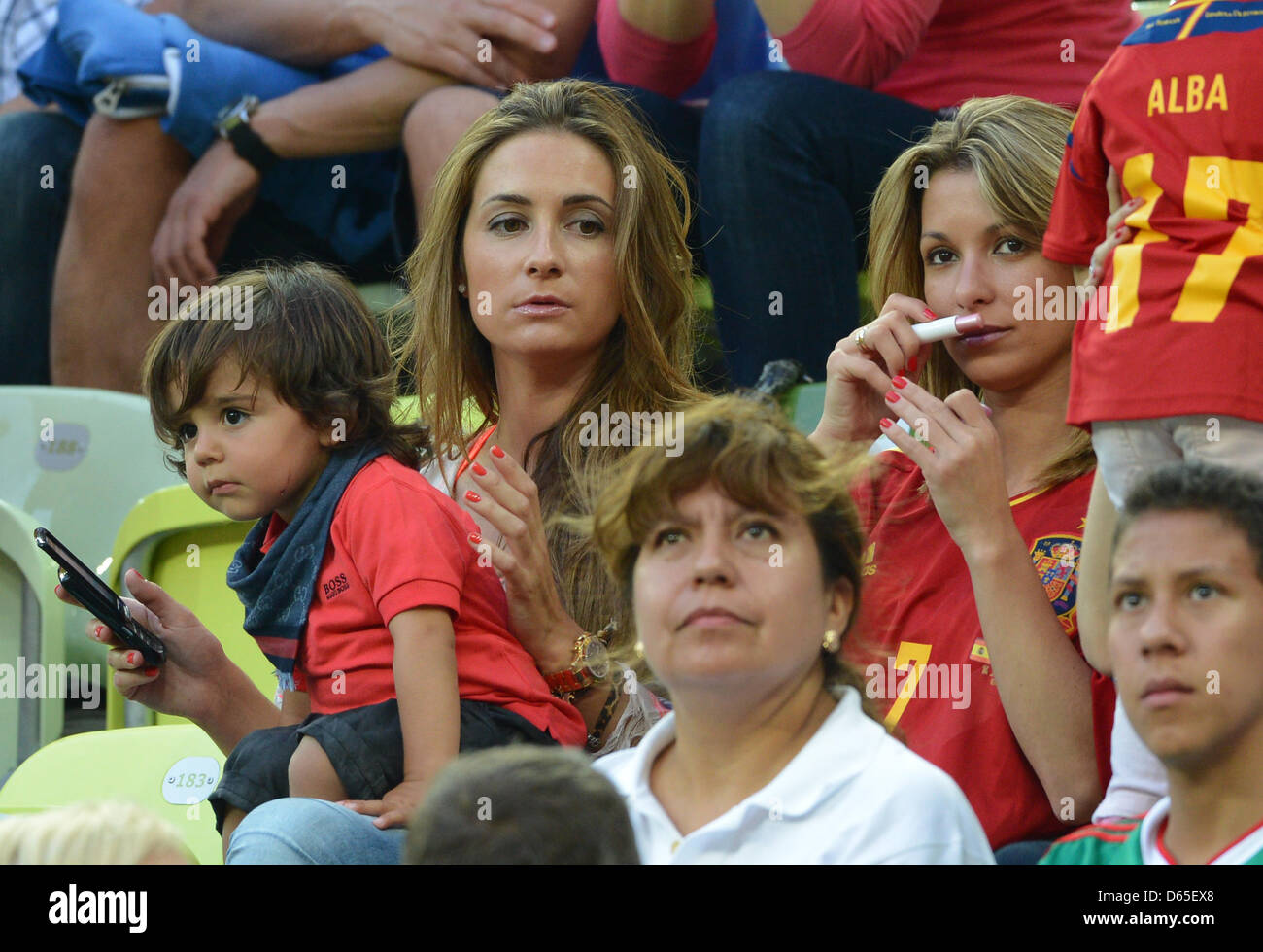 Carlota Ruiz (C), wife of Spain's Alvaro Arbeloa, before UEFA EURO 2012 ...