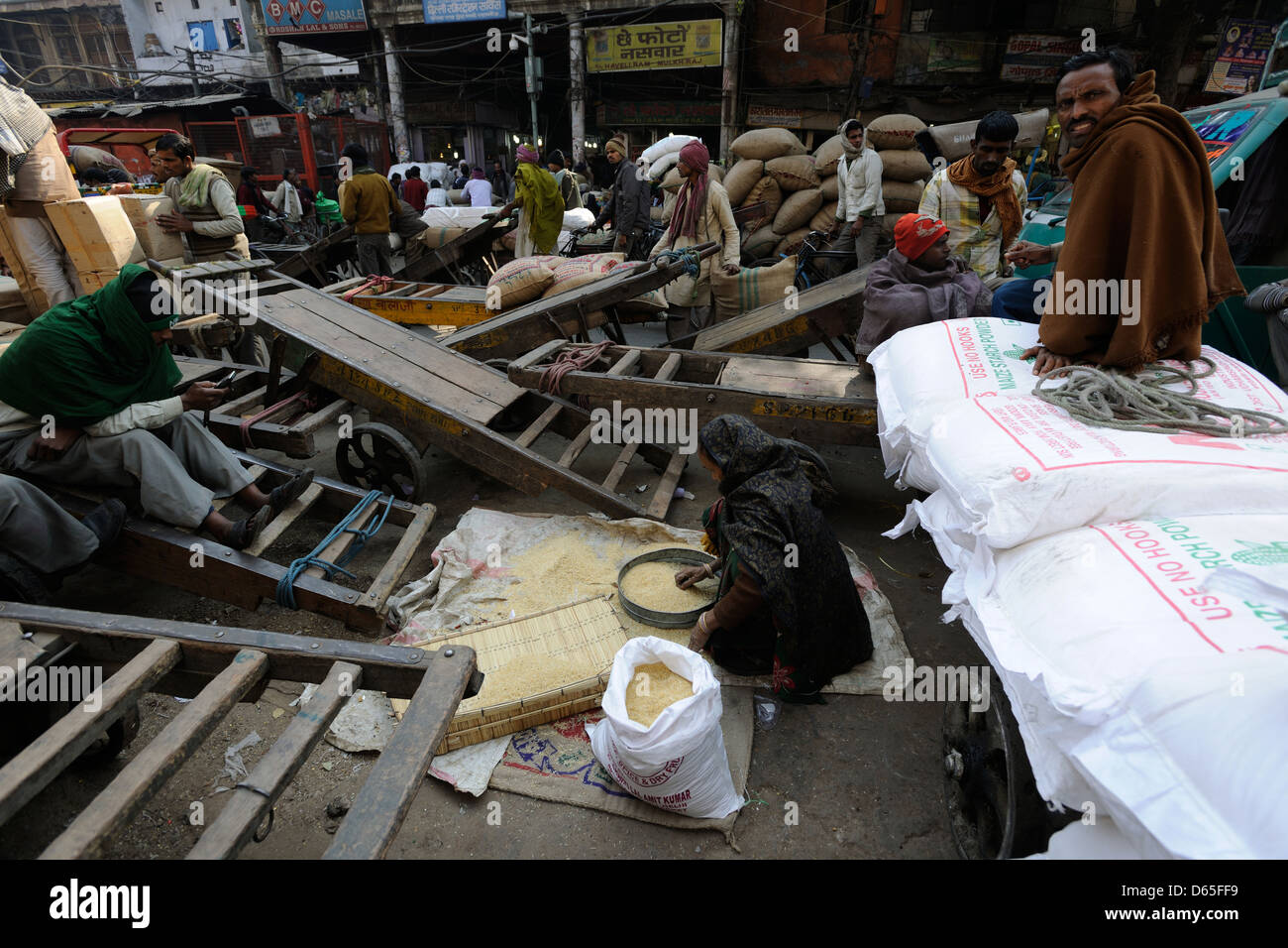 Delhi, India,woman selecting rice in an Indian Market Stock Photo - Alamy