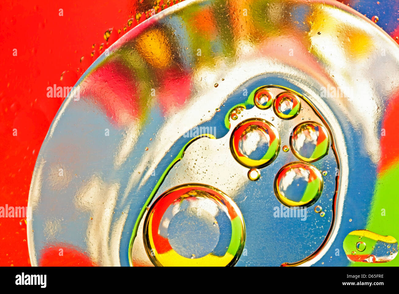 Oil drops on a water surface Stock Photo - Alamy