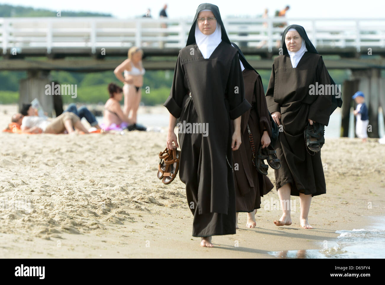 Nuns on the beach hi-res stock photography and images - Alamy