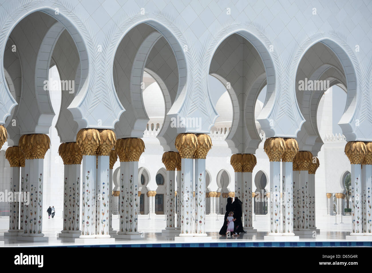 Tourists visit Sheikh Zayed Mosque in Abu Dhabi, United Arab Emirates ...