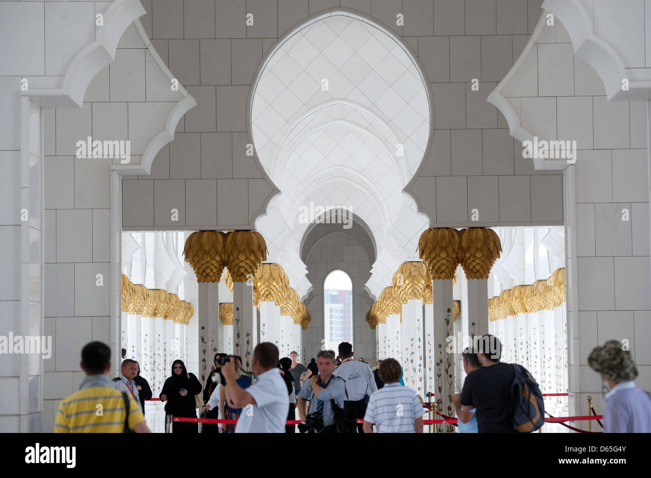 Tourists visit Sheikh Zayed Mosque in Abu Dhabi, United Arab Emirates ...