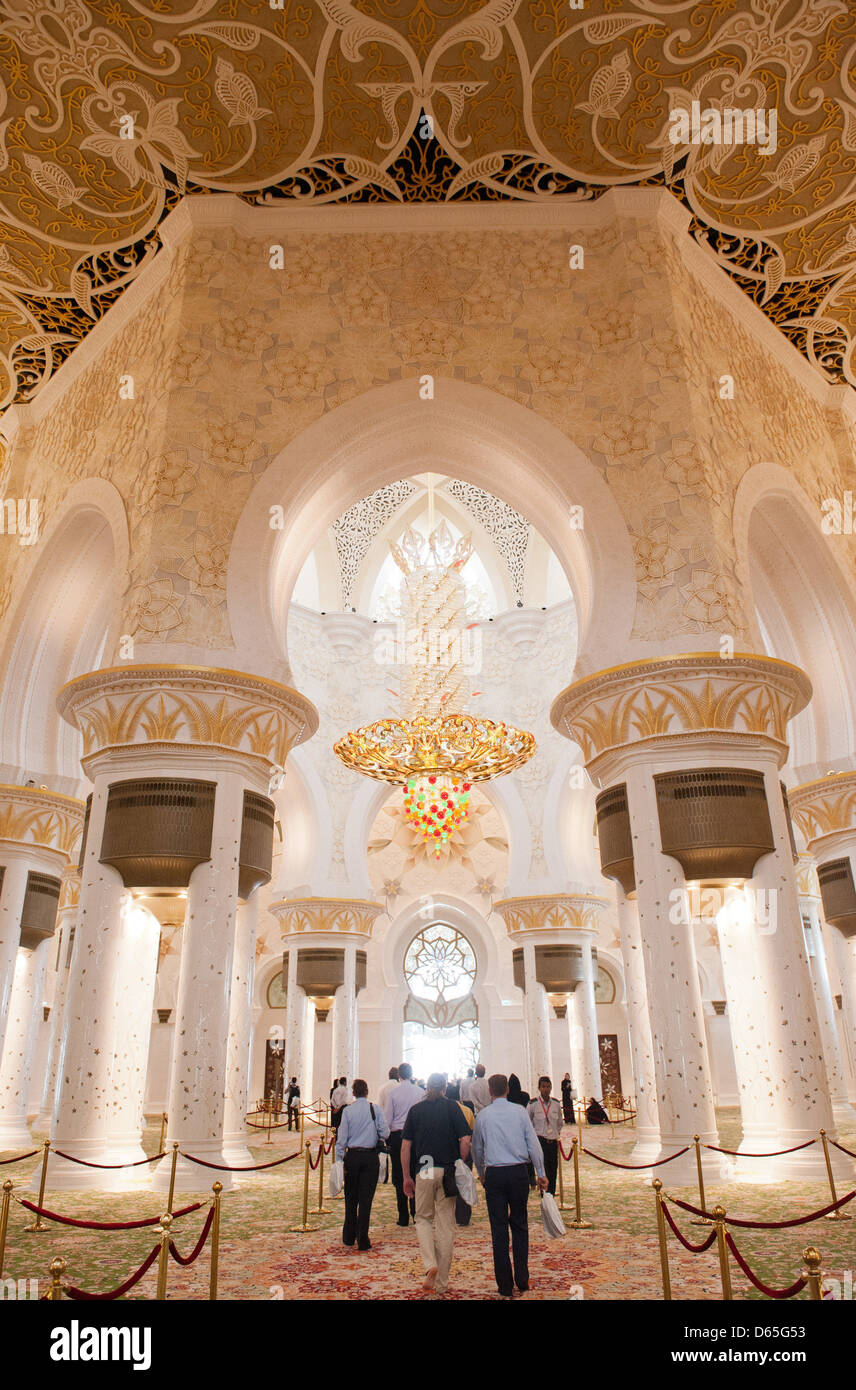 Tourists visit Sheikh Zayed Mosque in Abu Dhabi, United Arab Emirates ...