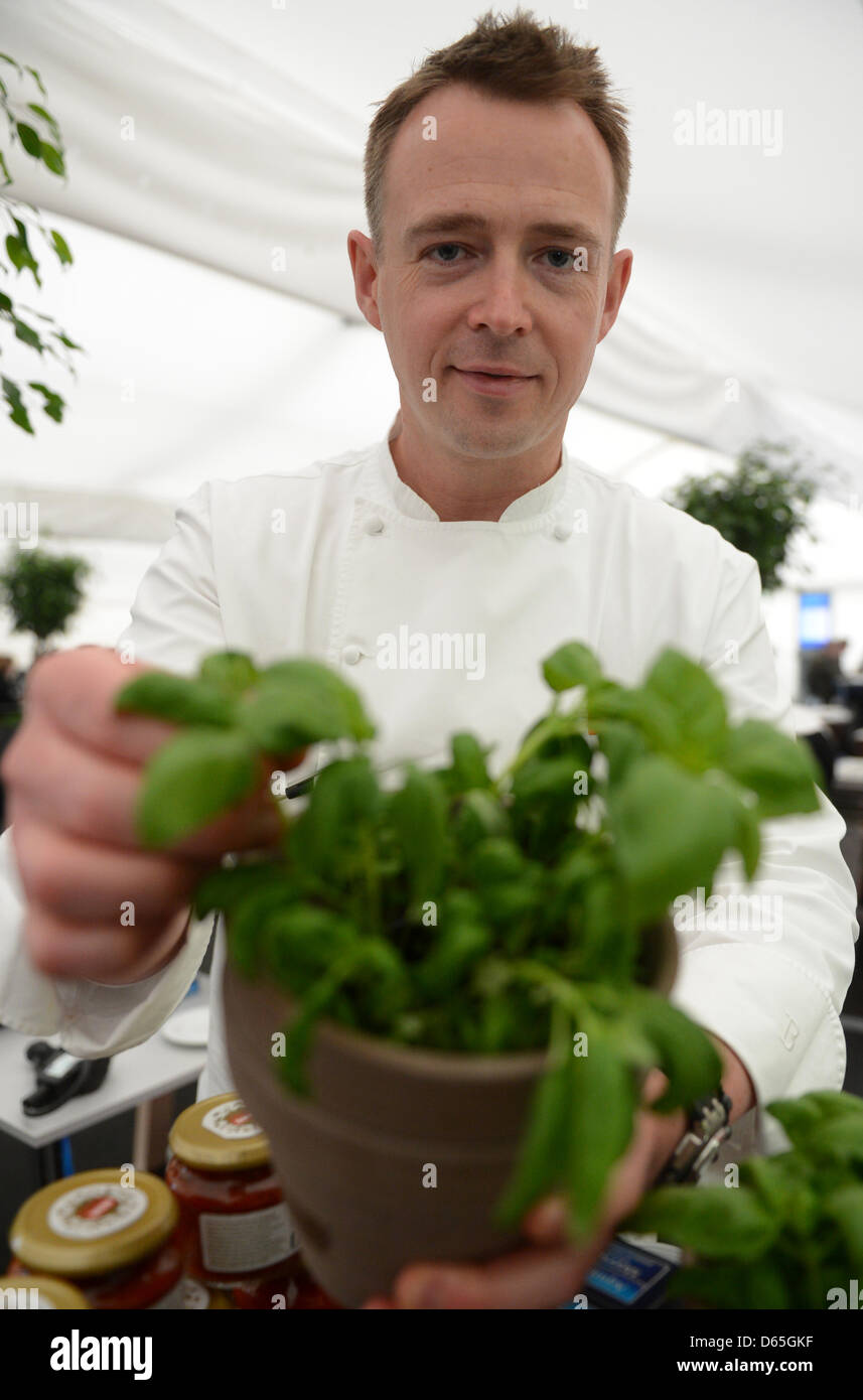 The cook of the German soccer team, Holger Stromberg, poses after a ...