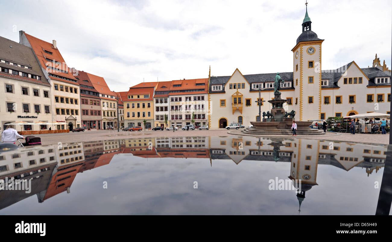 The city hall from 1410 dominates the Upper Market in Freiberg, Germany ...