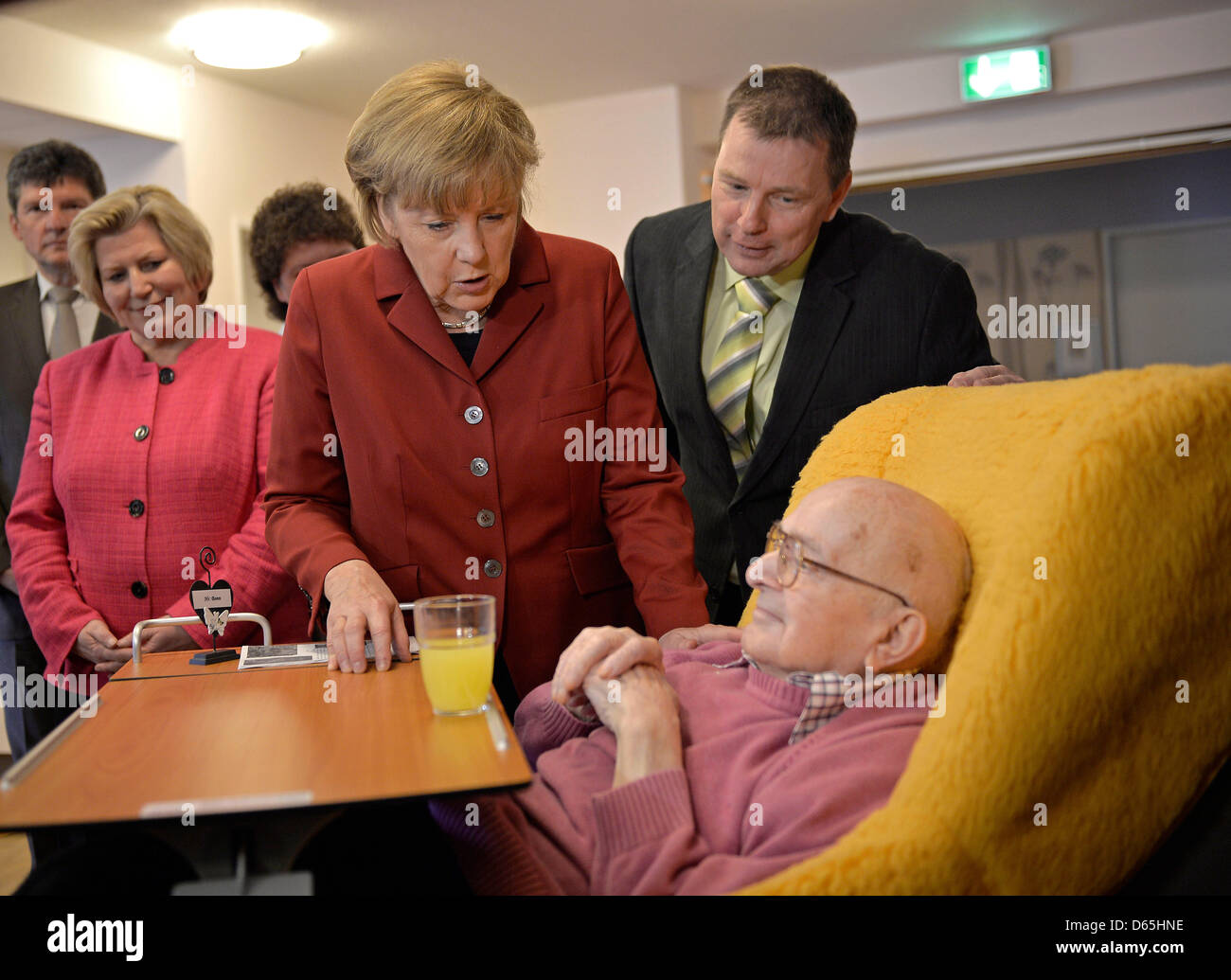 Melle, Germany. 12th April 2013. German Chancellor Angela Merkel greets ...