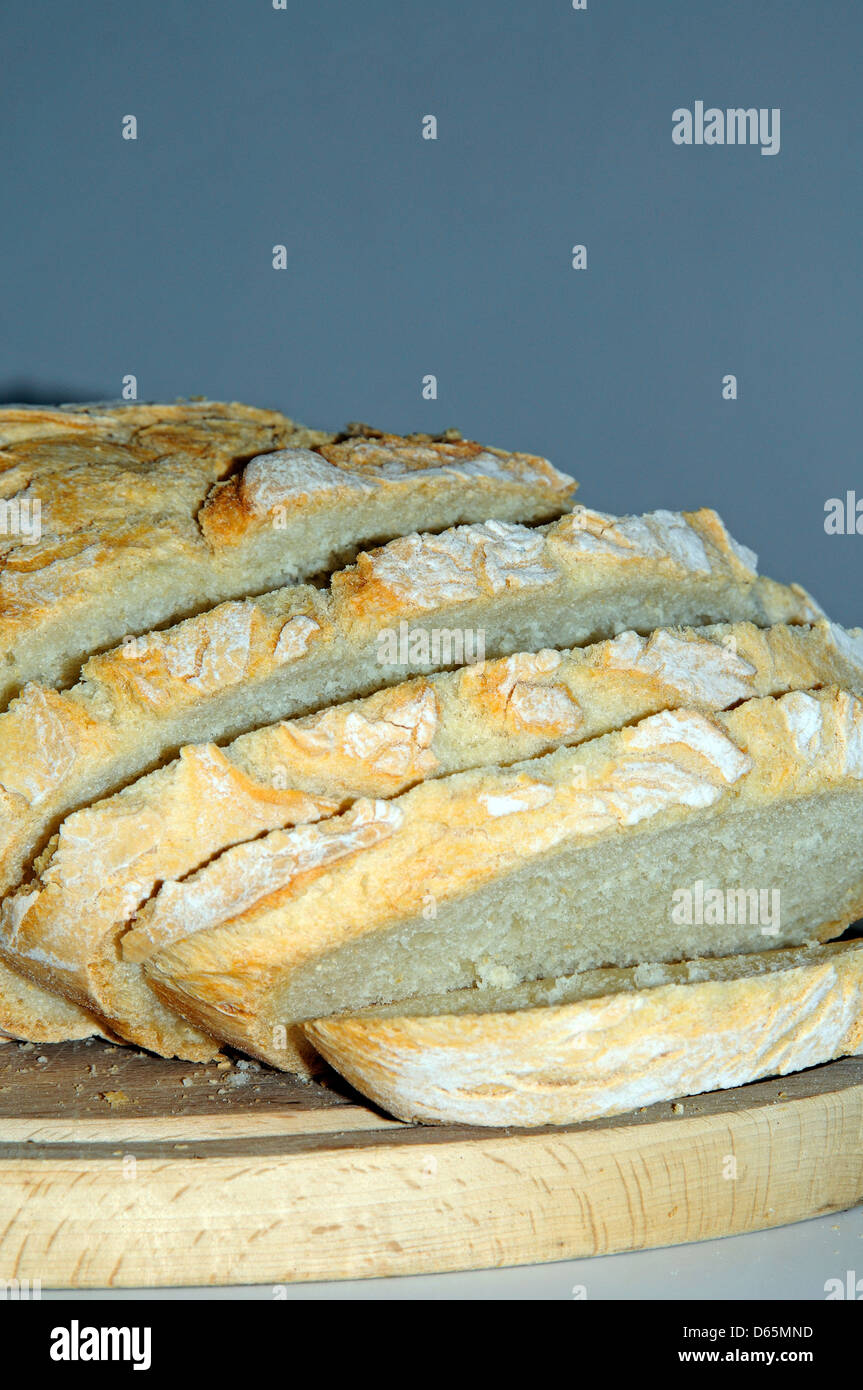 Freshly cooked rustic white bread sliced Stock Photo - Alamy