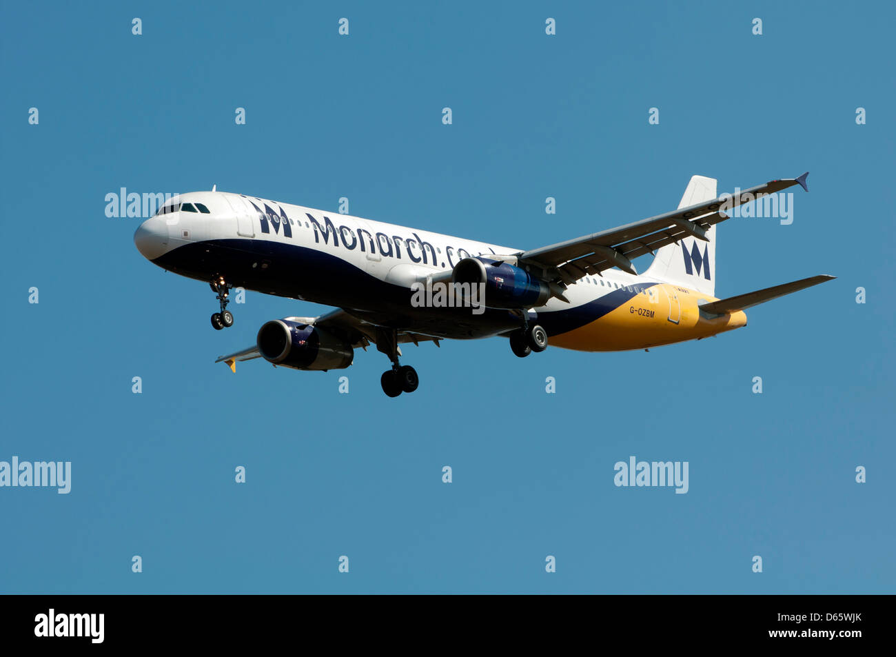 Monarch Airbus A321 approaching Birmingham Airport Stock Photo - Alamy
