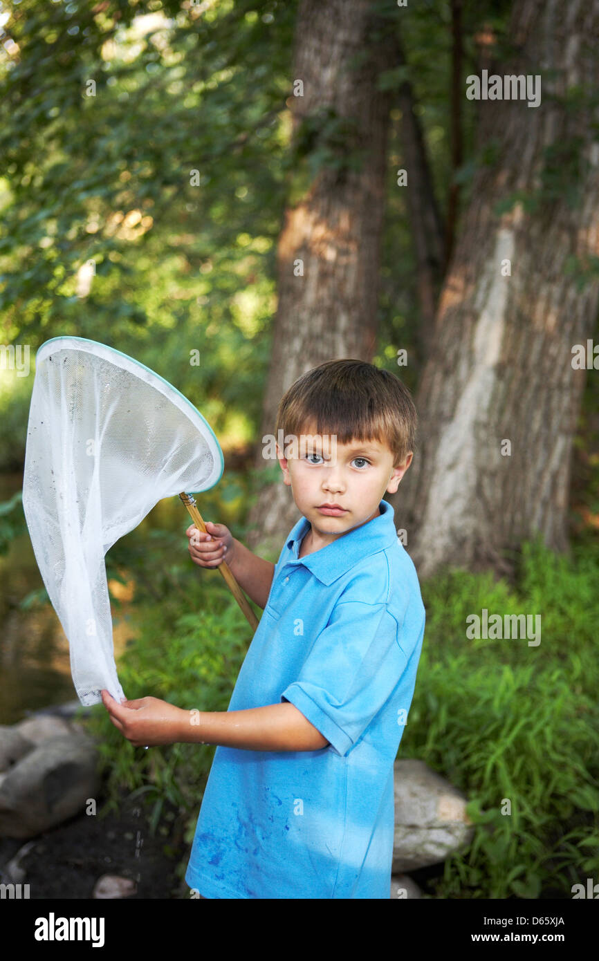 Child fishing net hi-res stock photography and images - Alamy