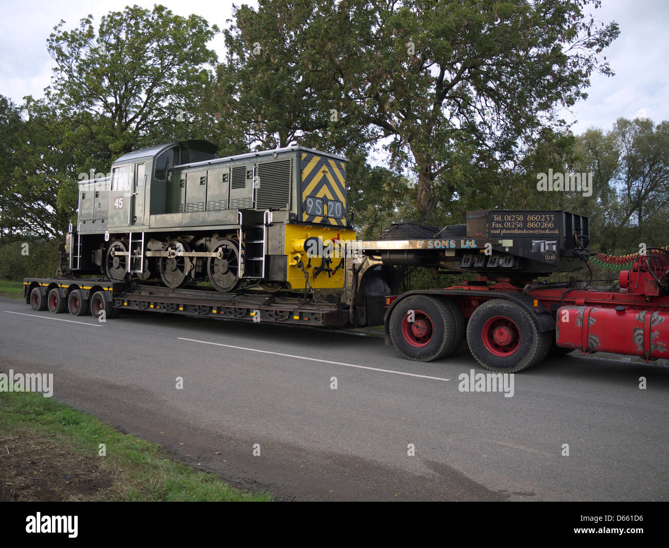 Vintage "Teddy bear" diesel locomotive on the back of a low loader at ...