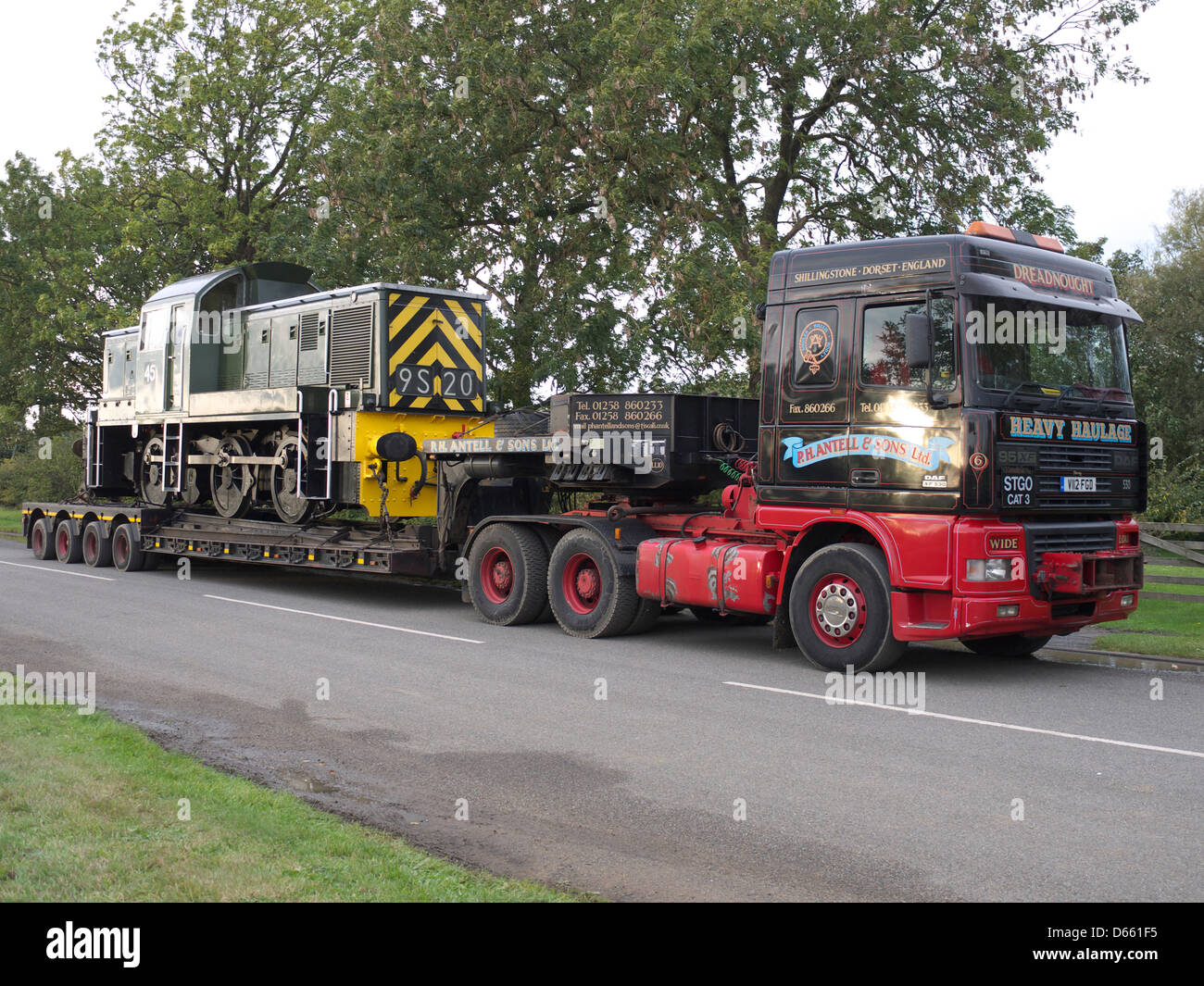 Vintage "Teddy bear" diesel locomotive on the back of a low loader at ...