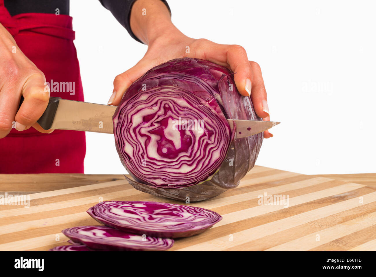 Hands chopping a fresh red cabbage Stock Photo - Alamy