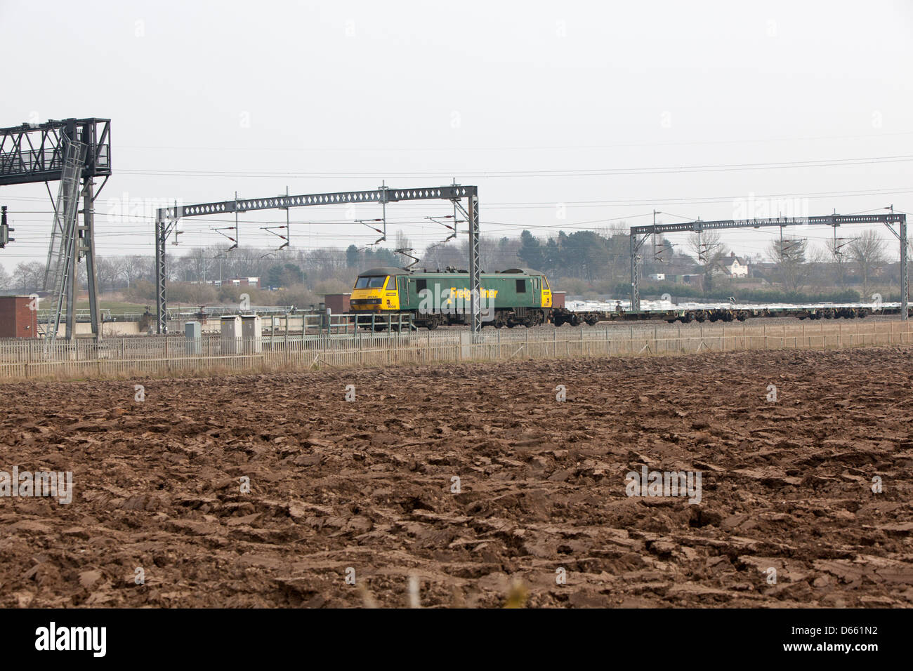 Containers of freight traveling along the West Coast Mainline railway ...